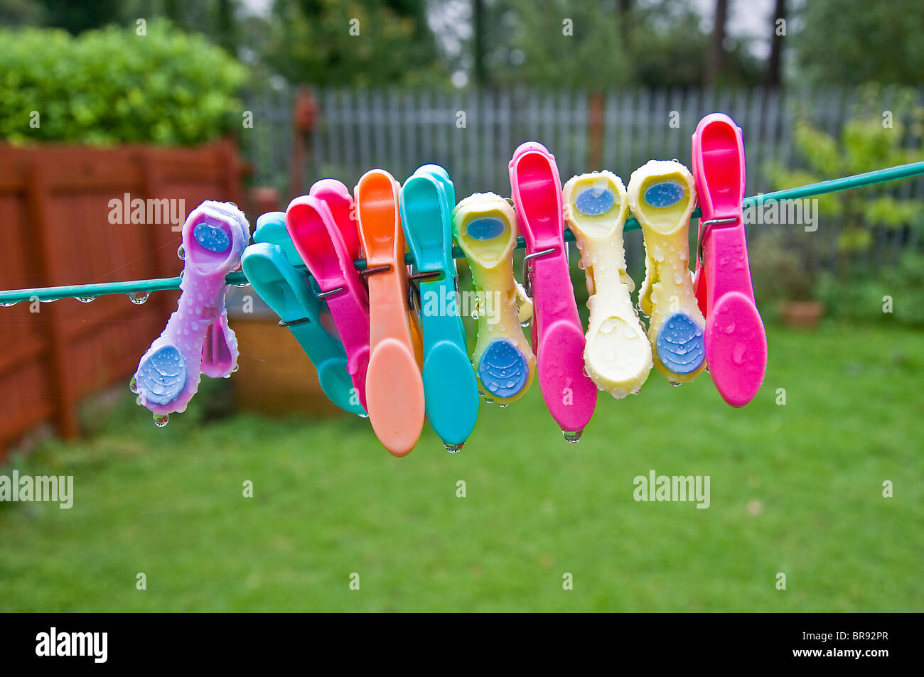 Colourful clothes pegs hi-res stock photography and images - Alamy