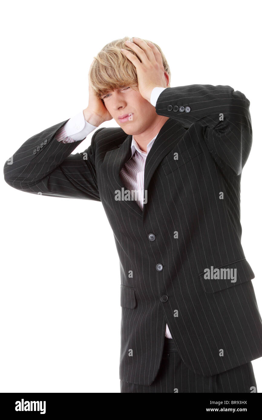 Young businessman with a big headache Stock Photo - Alamy