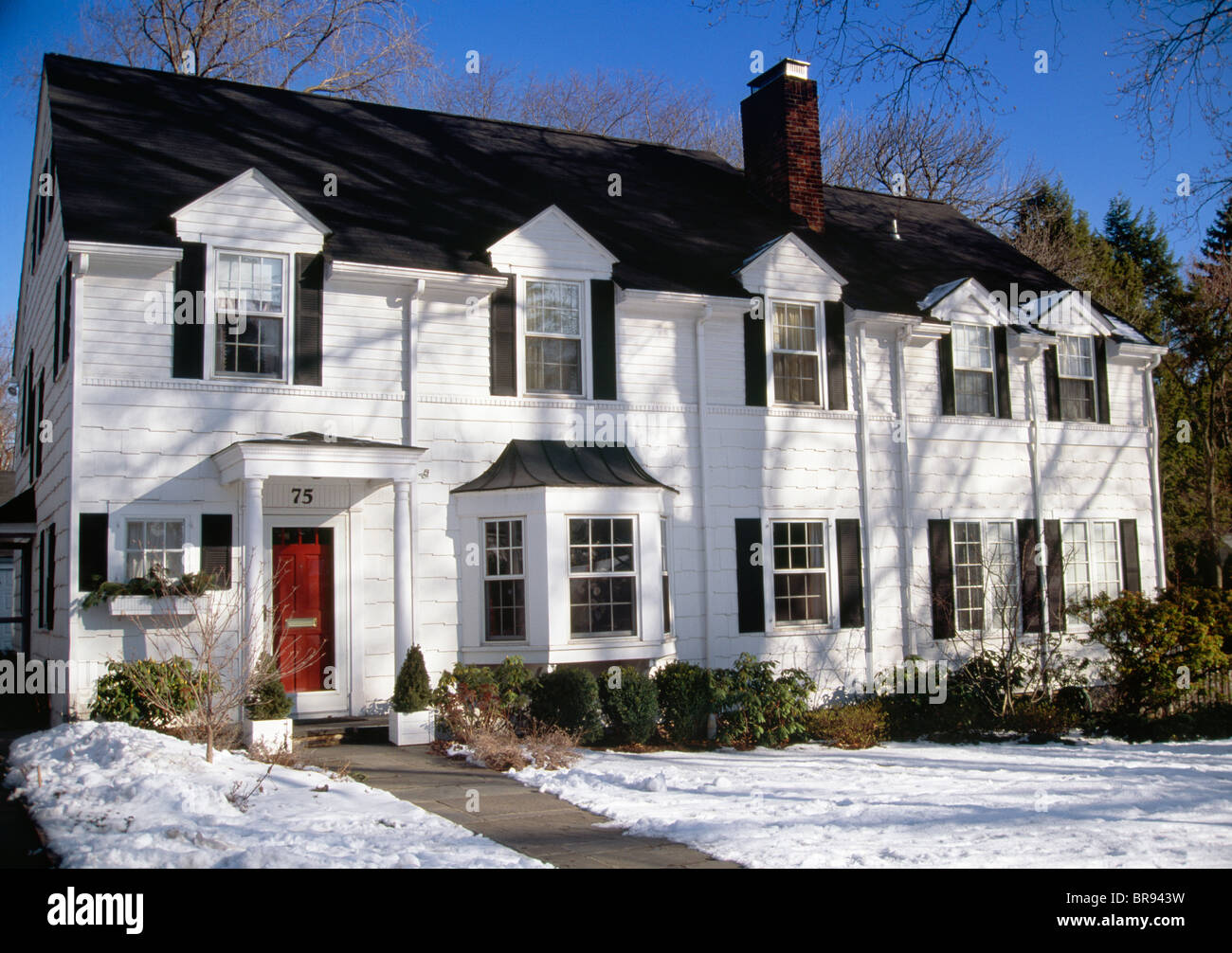 Suburban House in the Snow Stock Photo - Alamy