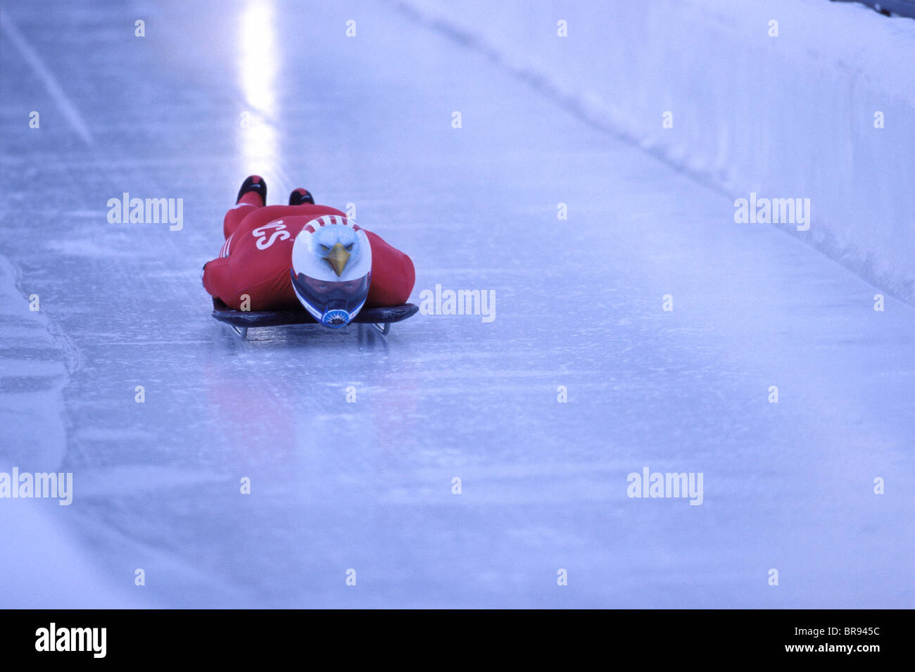 Skeleton racer flying down an ice track Stock Photo - Alamy