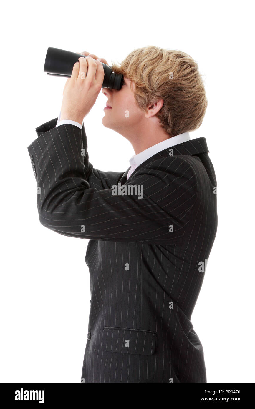 Business Vision concept - young man with binoculars isolated on white ...