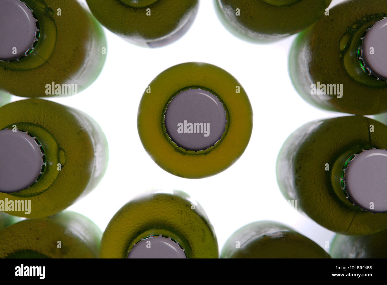 looking down at beer bottle from above on a white background Stock ...