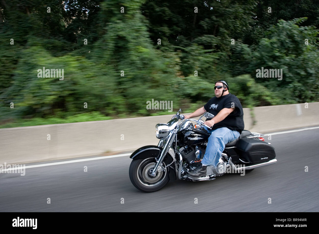 Overweight man riding motorcycle hi-res stock photography and images ...