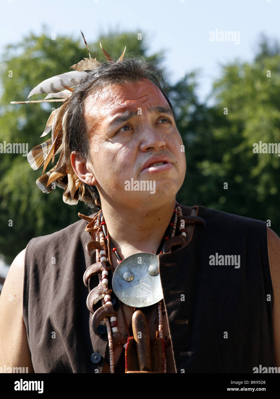 Headshot of a Cherokee man, member of the Warriors of AniKituhwa group ...