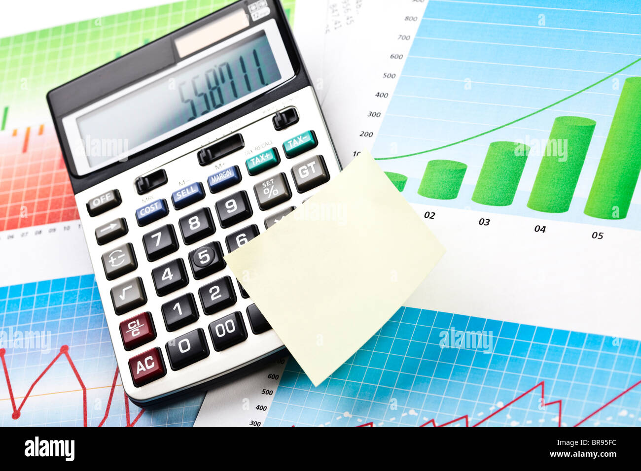 Calculator and diagram Stock Photo - Alamy