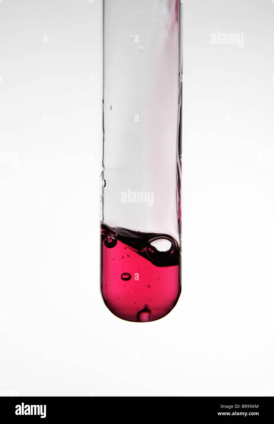 close up detail of single test tube on white background Stock Photo - Alamy