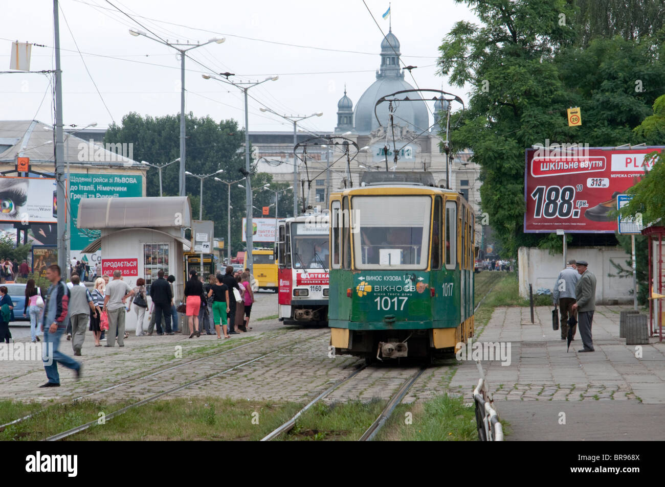 Trams in Lviv, Ukraine with rail station in background Stock Photo - Alamy
