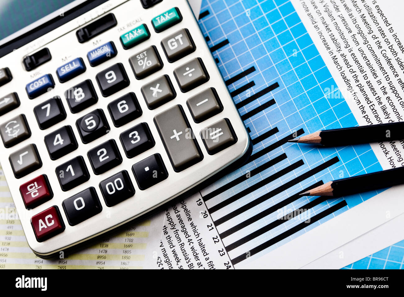 Calculator and diagram Stock Photo - Alamy
