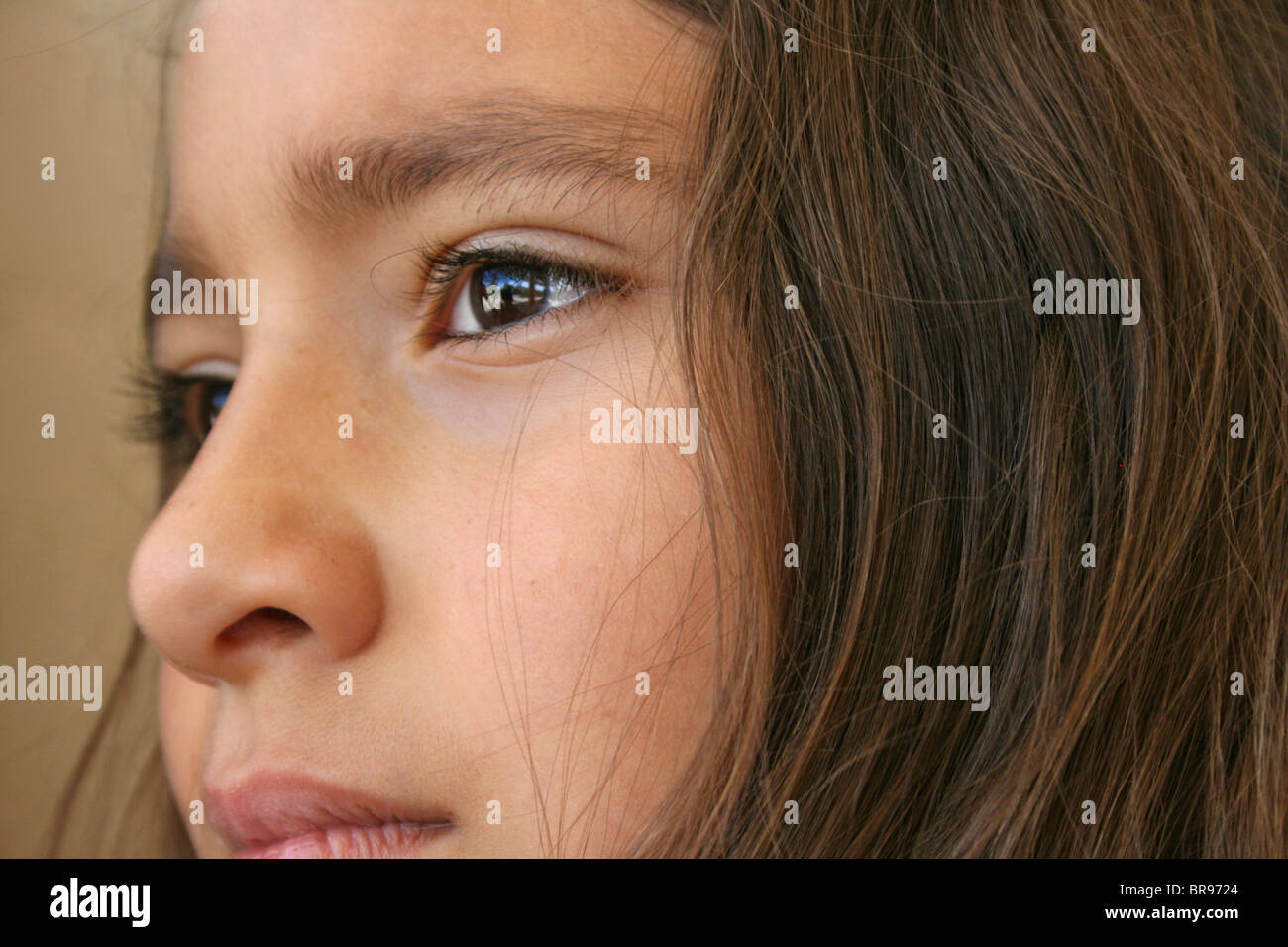 close up of Hispanic girl with worried expression Stock Photo - Alamy
