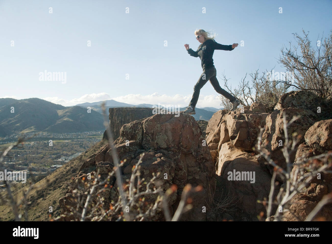 Jump mountain rock leap hi-res stock photography and images - Alamy