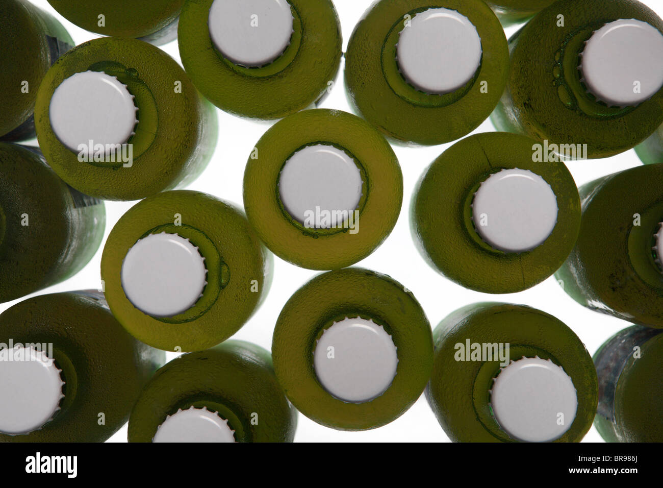looking down at beer bottle from above on a white background Stock ...