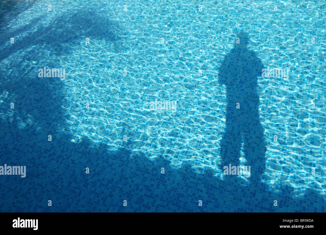 Shadow of a person in a swimming pool Stock Photo - Alamy