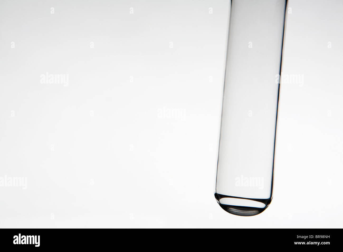 close up detail of single test tube on white background Stock Photo - Alamy