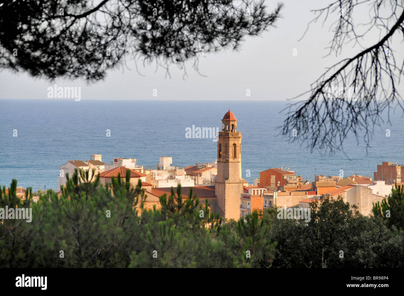View of a section of the town Calella and its old church - Spain Stock ...