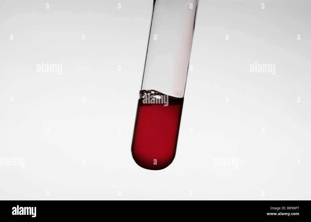 close up detail of single test tube on white background Stock Photo - Alamy