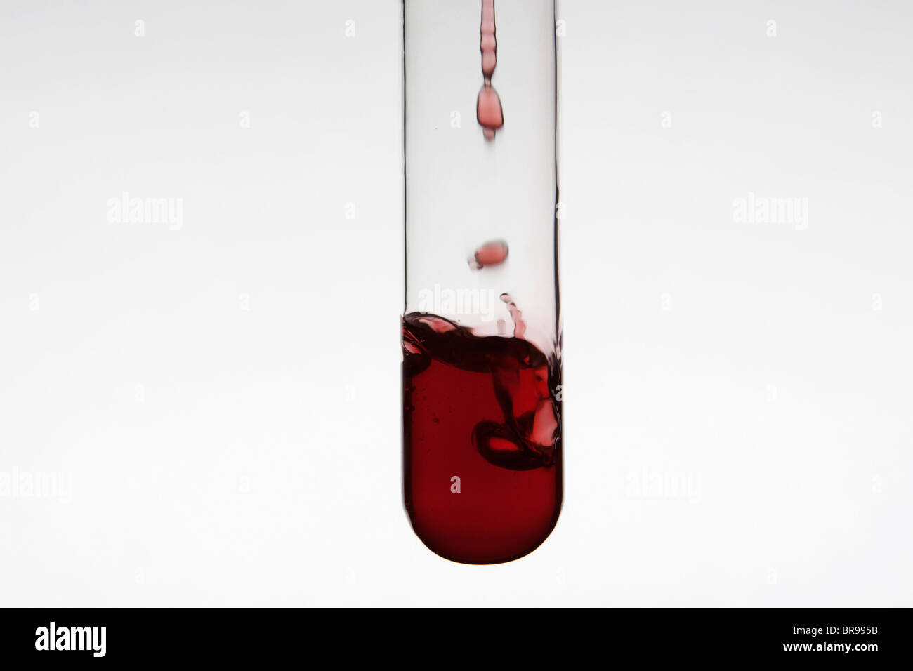 close up detail of single test tube on white background Stock Photo - Alamy
