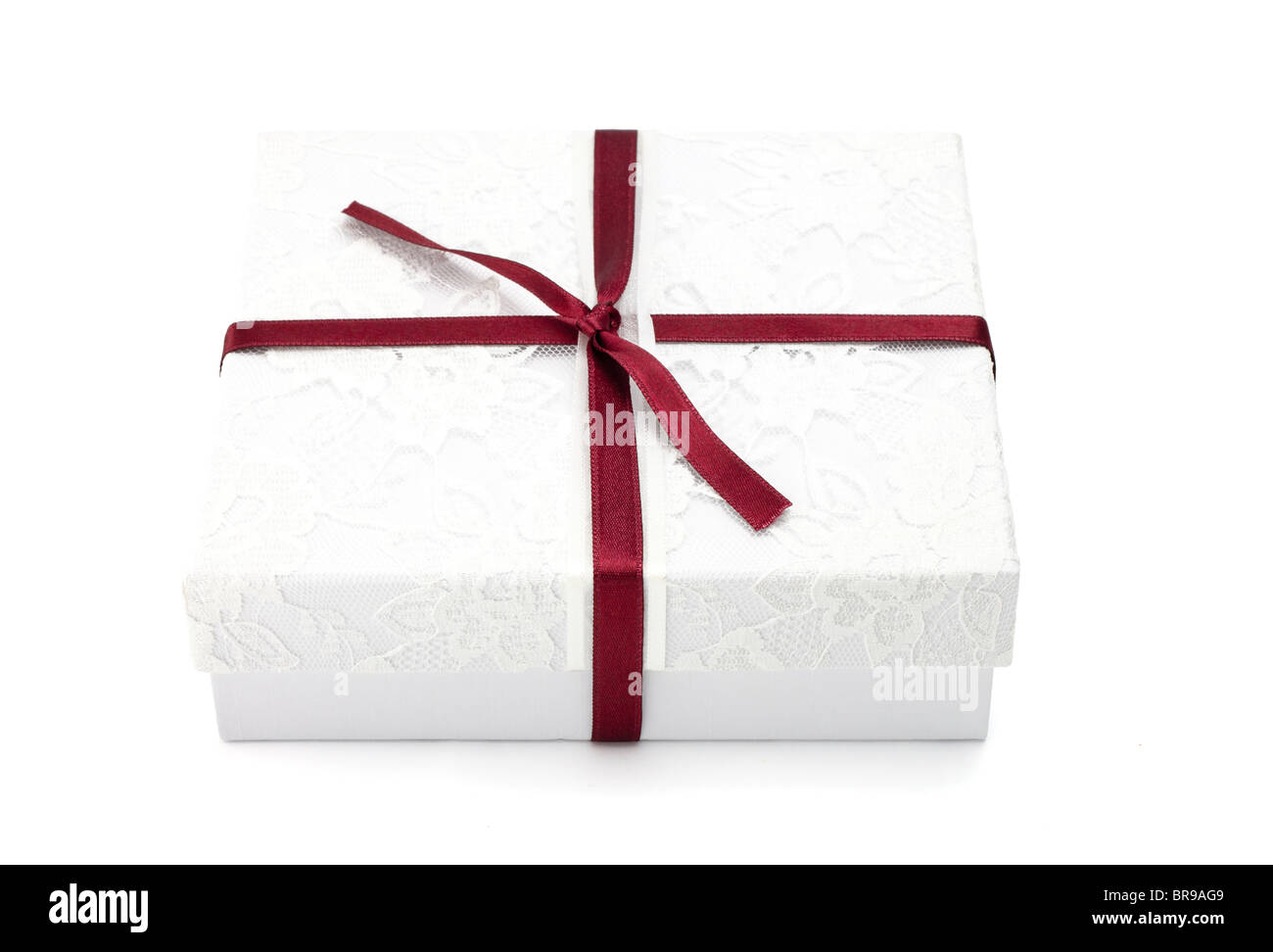 White gift box with dark red ribbon Stock Photo - Alamy