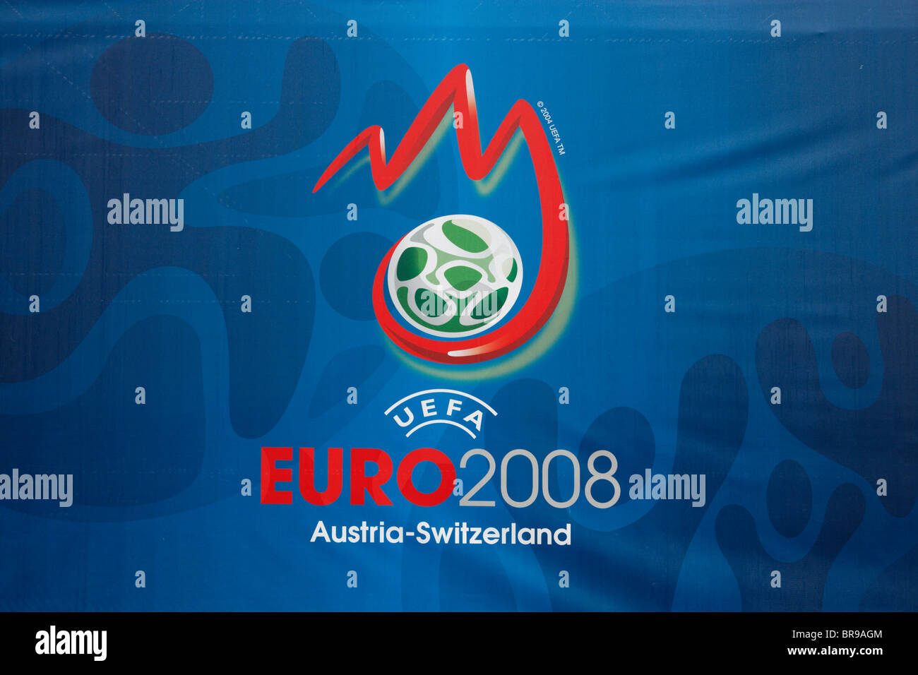 The UEFA Euro 2008 soccer tournament logo as posted on a fence near a ...