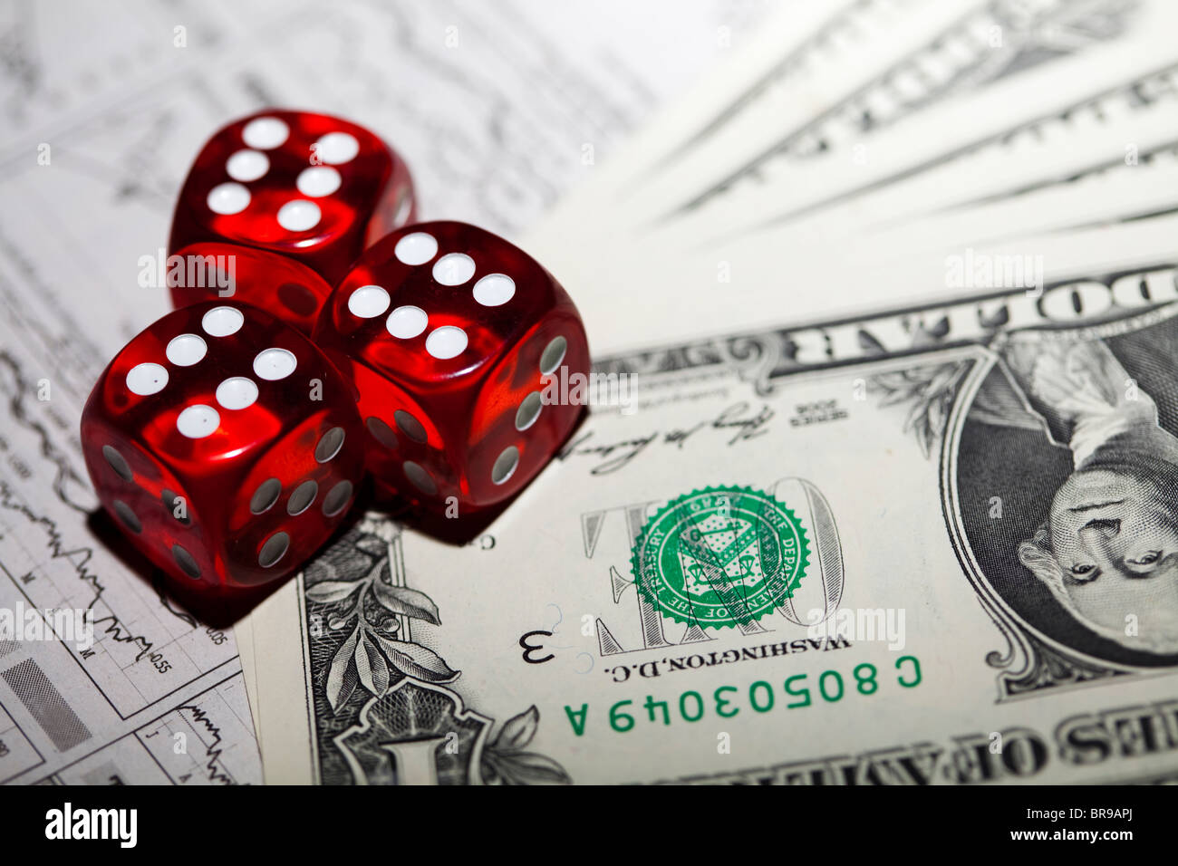 Dice on cards Stock Photo - Alamy