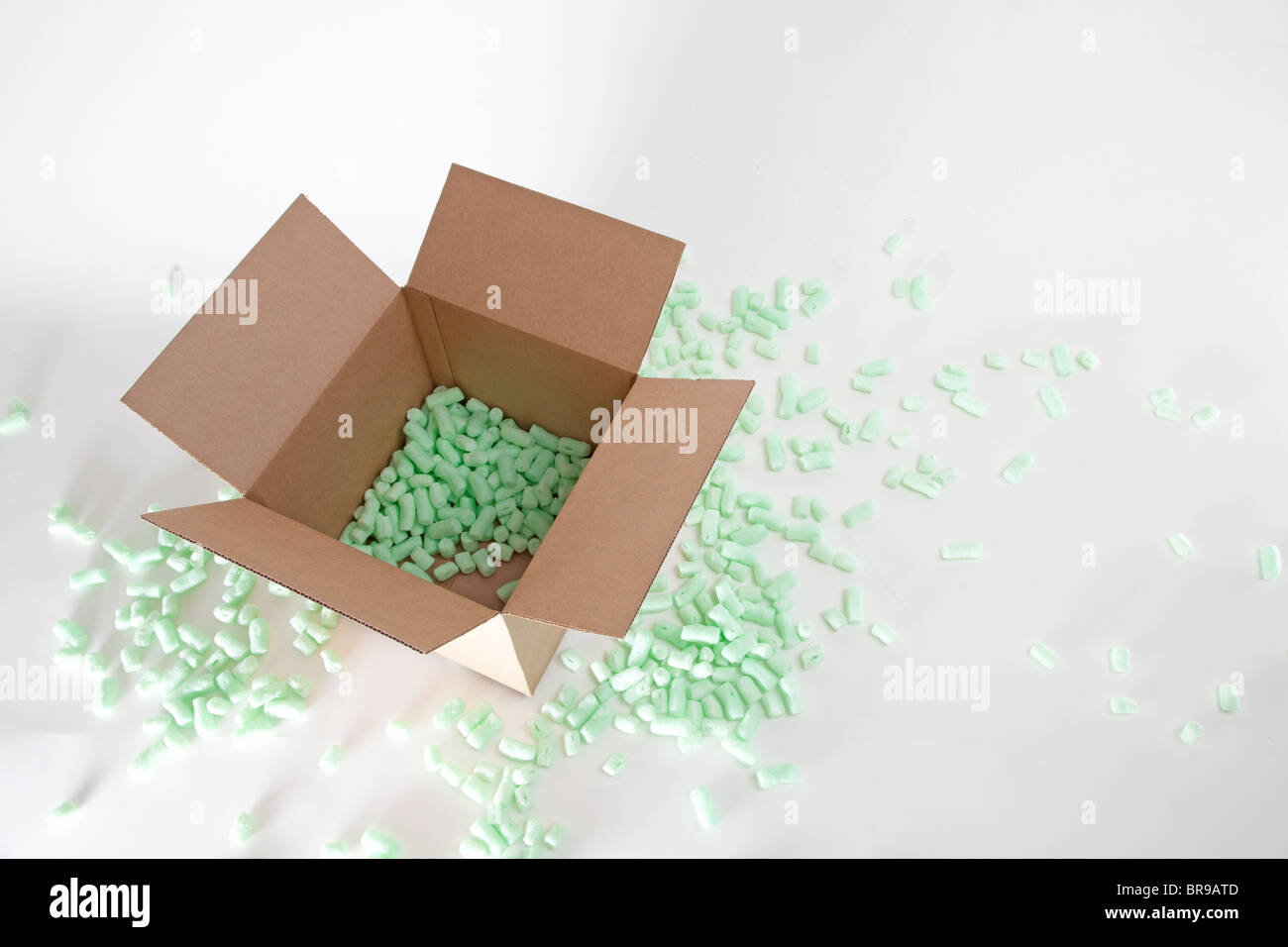 packing peanuts in cardboard box Stock Photo - Alamy
