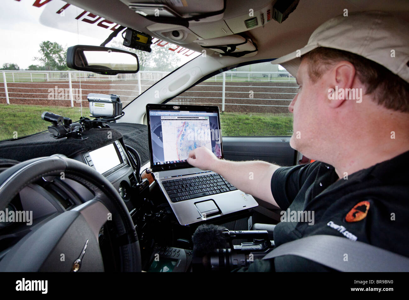 Storm Chaser David Drummond monitors a developing severe storm in ...