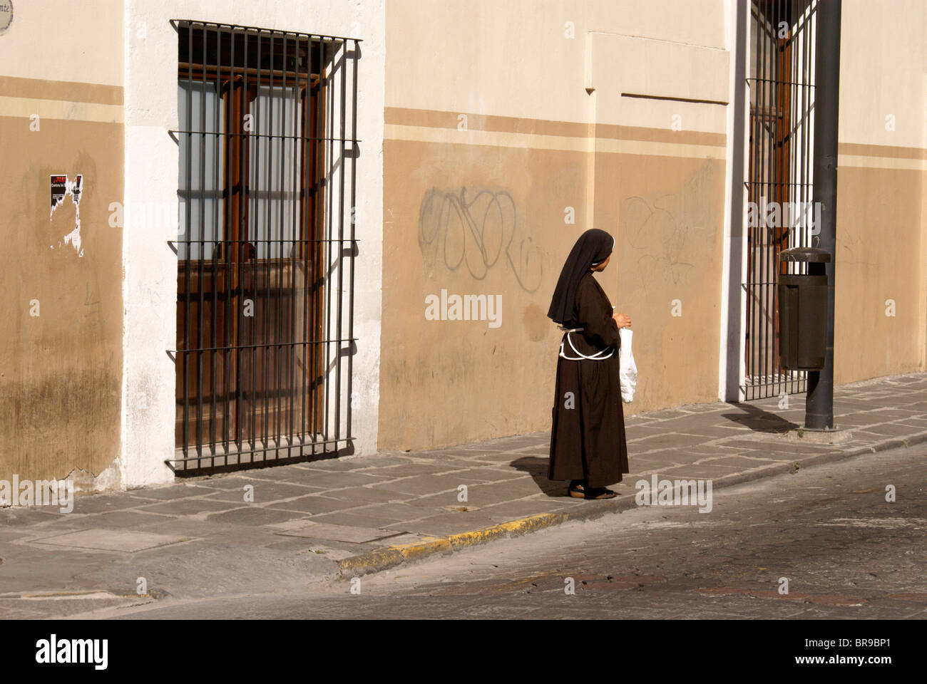 Nun standing on a street in the city of Puebla, Mexico Stock Photo - Alamy