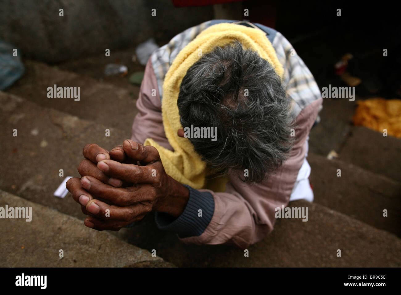 A man praying on the stairs of Sri Pada or 'Adam's Peak ' Sri Lanka ...