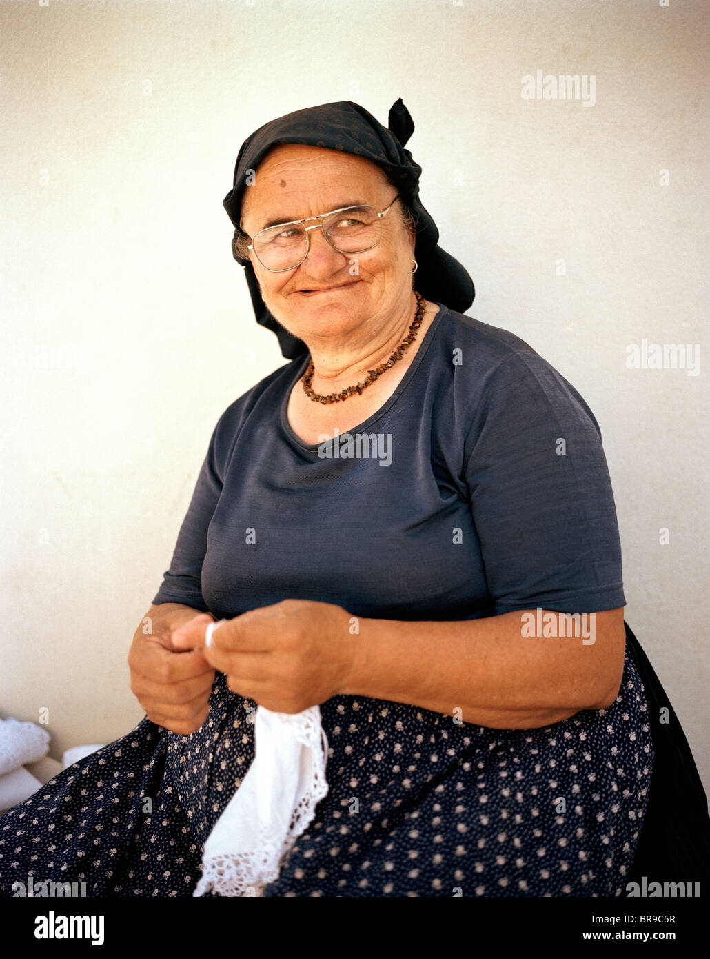 Old lady sewing hi-res stock photography and images - Alamy