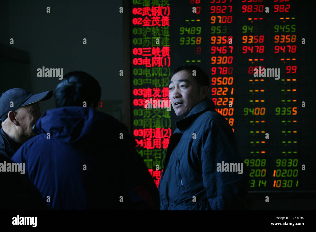 Stocks for three people hi-res stock photography and images - Alamy