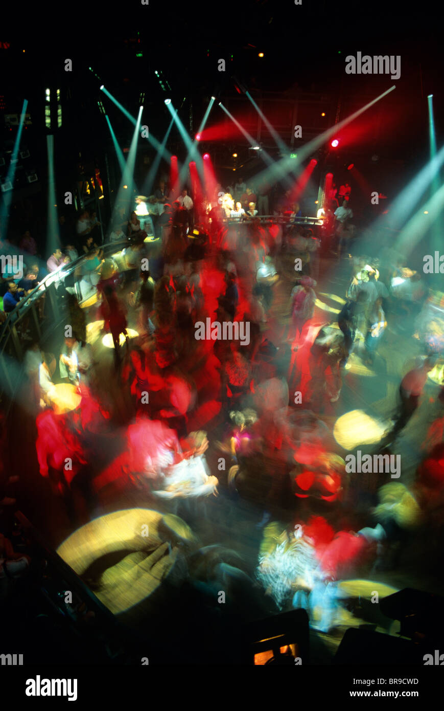 1990s VIEW LOOKING DOWN ONTO DISCO DANCE FLOOR COUPLES DANCING COLORFUL ...