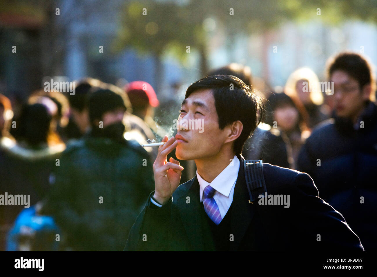 Asian smoker hi-res stock photography and images - Alamy