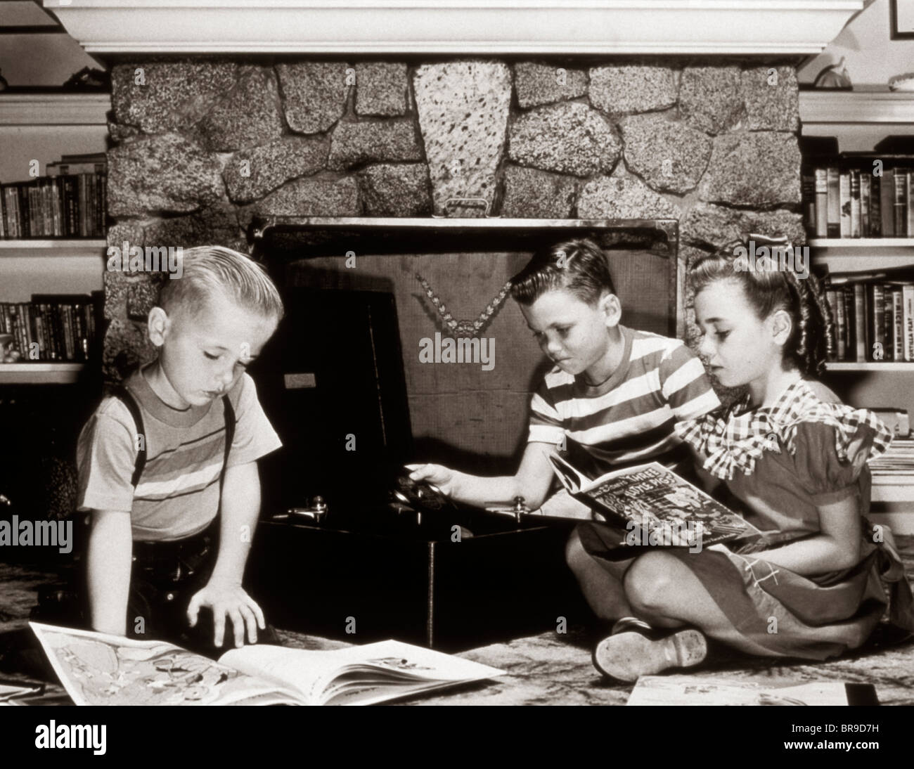 Child listening to music 1950s hi-res stock photography and images - Alamy