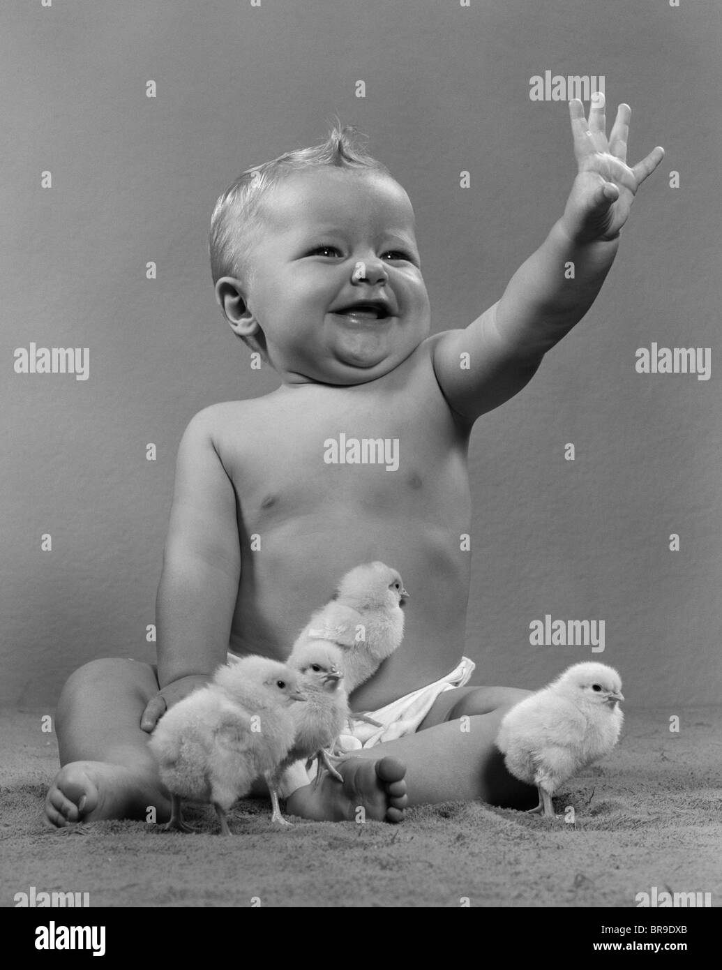 Laughing baby 1950s hi-res stock photography and images - Alamy