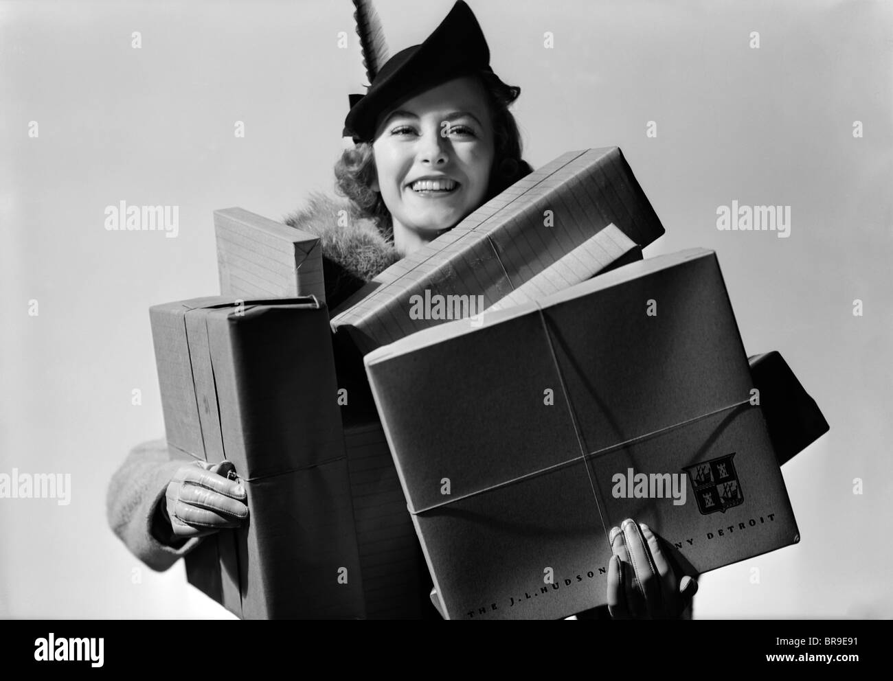 1930s 1940s WOMAN SHOPPING CARRYING LOTS OF PACKAGES Stock Photo - Alamy