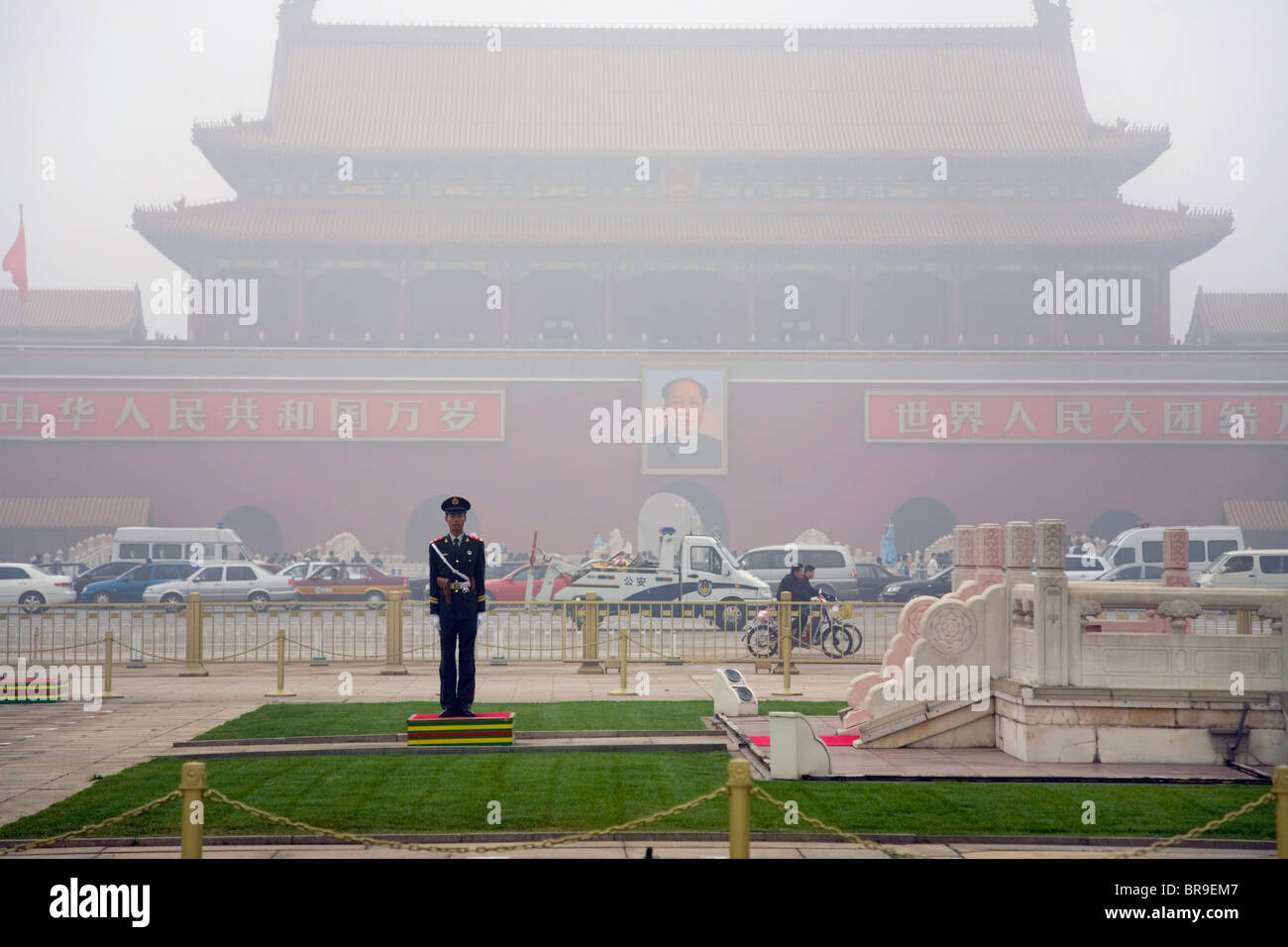 A policeman standing guard at the Gate of Heavenly Peace in Beijing ...