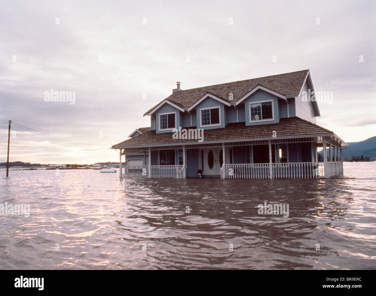 HOUSE SURROUNDED BY FLOOD WATER Stock Photo - Alamy