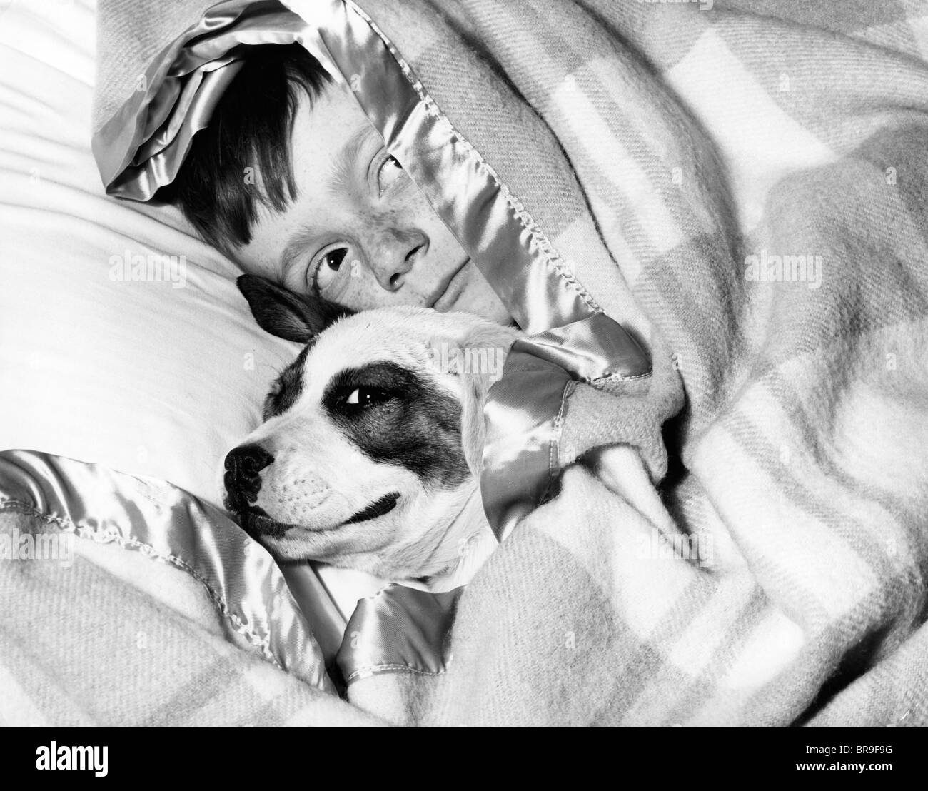 Hiding under blanket 1950s hi-res stock photography and images - Alamy