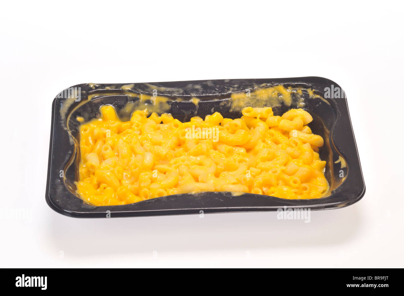 Tray of cooked macaroni and cheese on white background cutout Stock ...