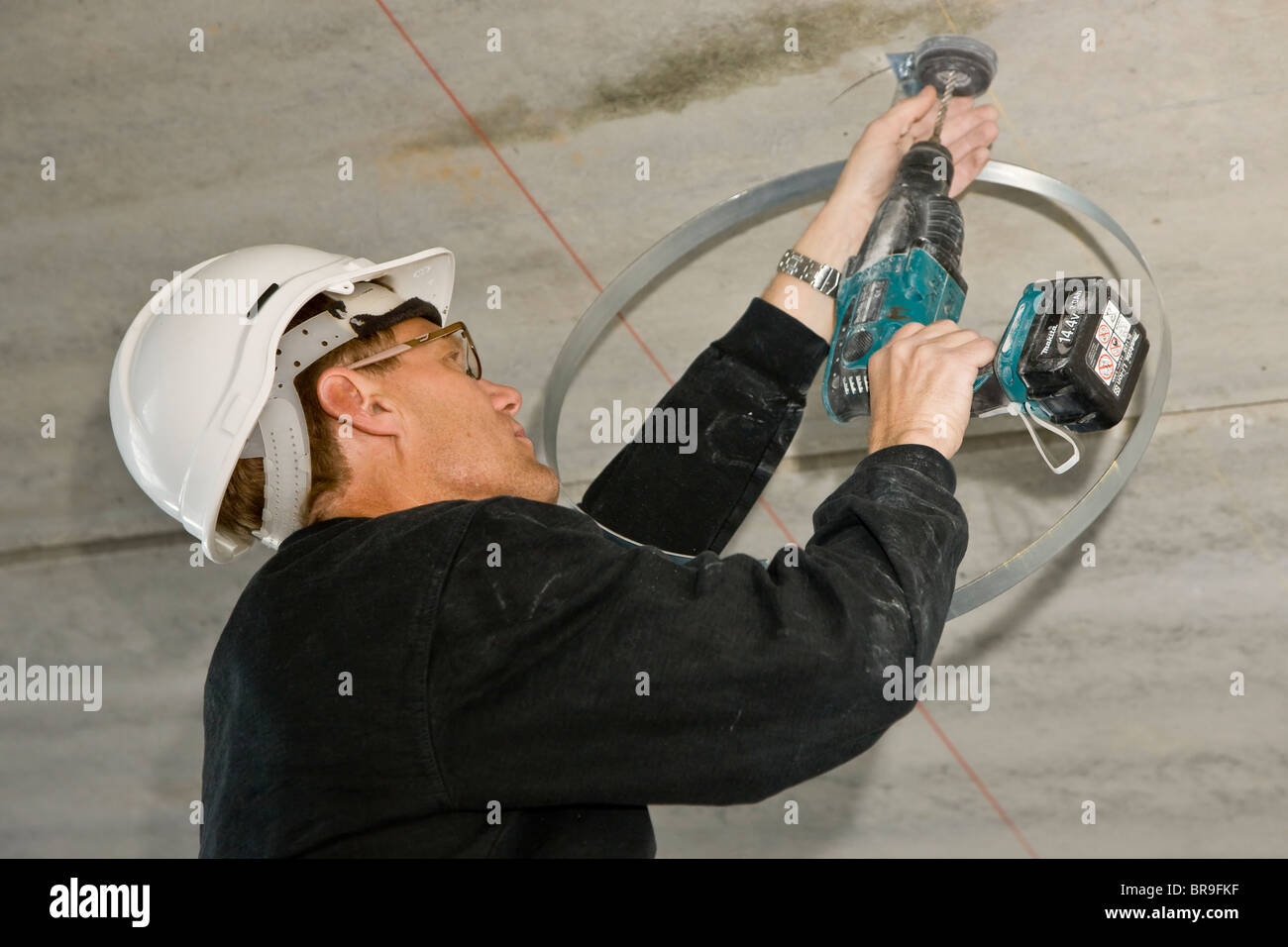 Ventilation fitter installing the fitting for a ventilation pipe Stock ...
