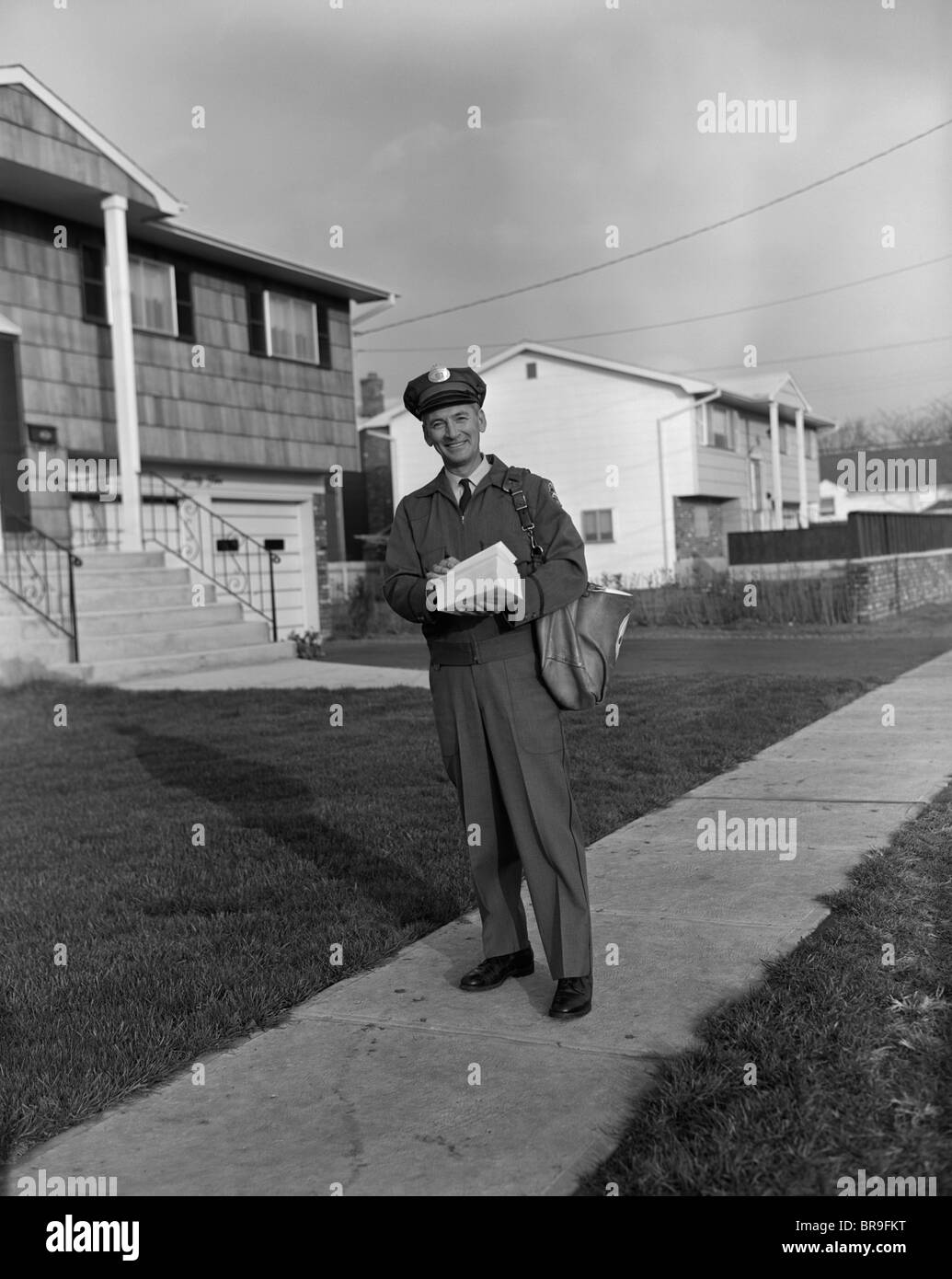 Usps mailman Black and White Stock Photos & Images - Alamy