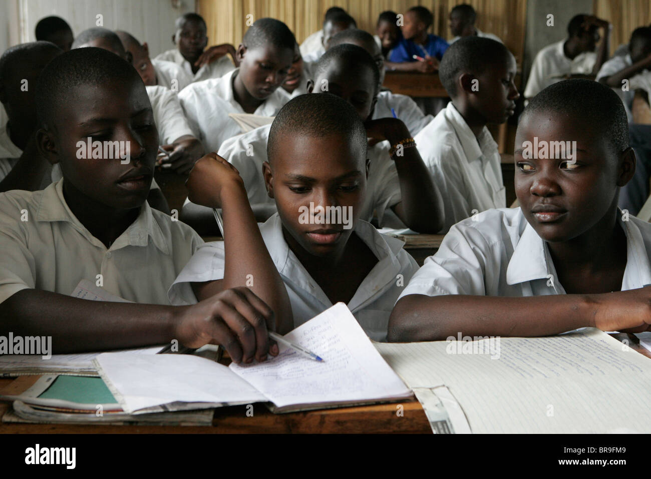 Young girls study at a school room in rural Uganda Stock Photo - Alamy