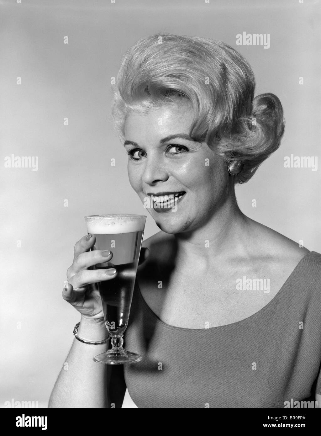 Smiling woman glass white Black and White Stock Photos & Images - Alamy