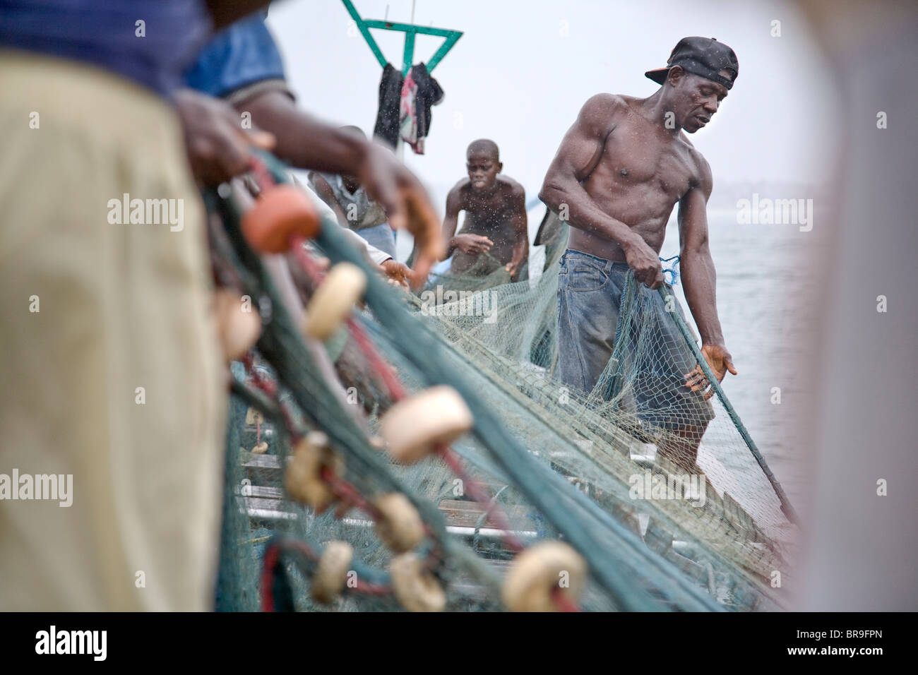 Torn fishing nets hi-res stock photography and images - Alamy