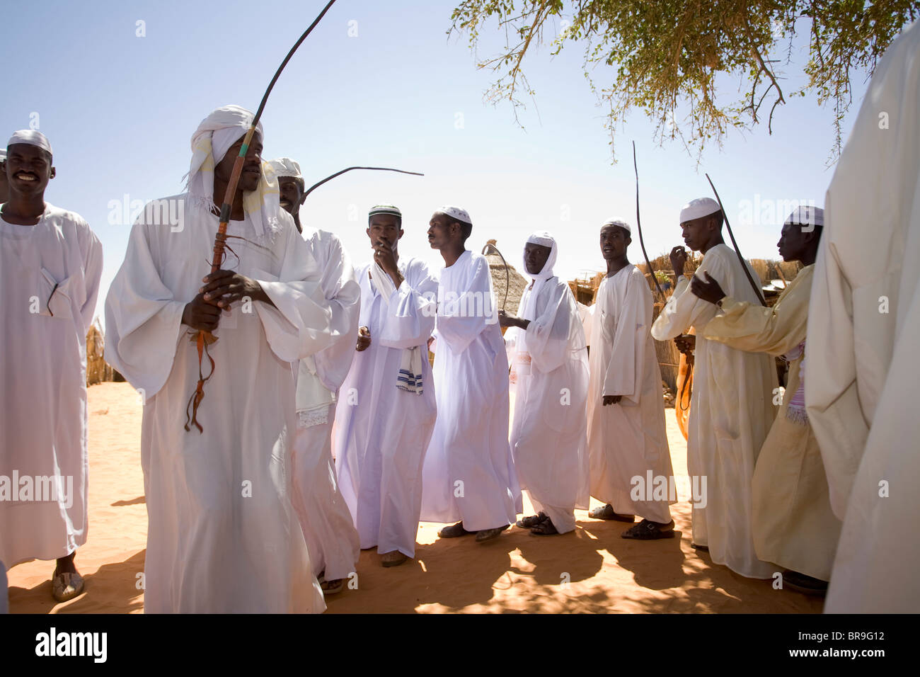Young men of the Darhammid tribe dance in the village of Limrat North ...