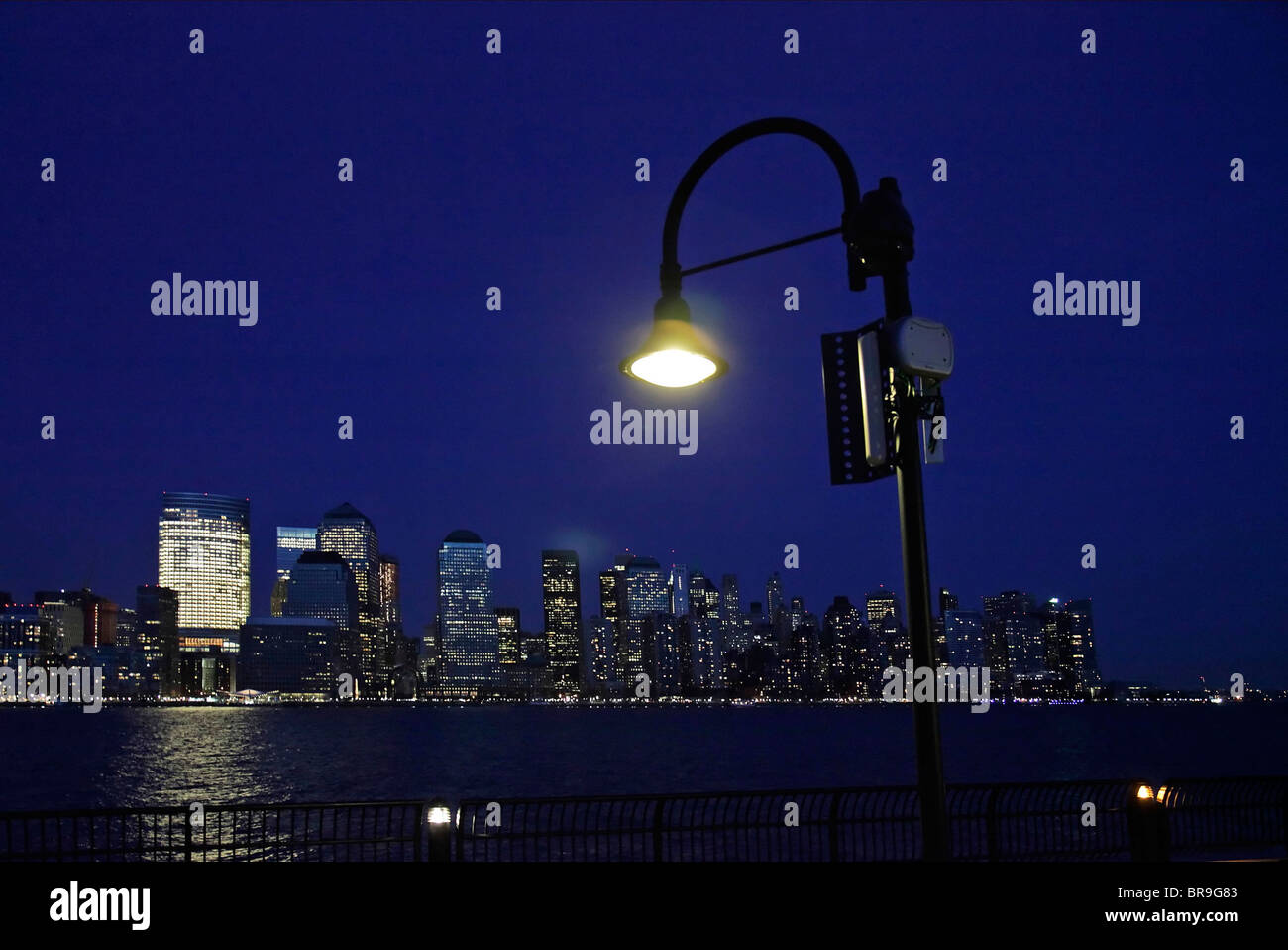 Lonely street light looking at New York City Stock Photo - Alamy