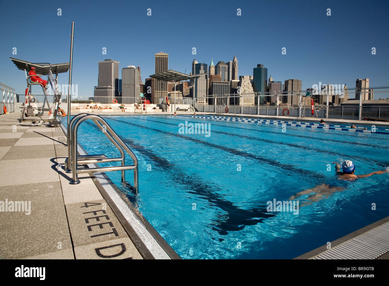 The Floating Pool Lady anchors in Brooklyn Stock Photo - Alamy