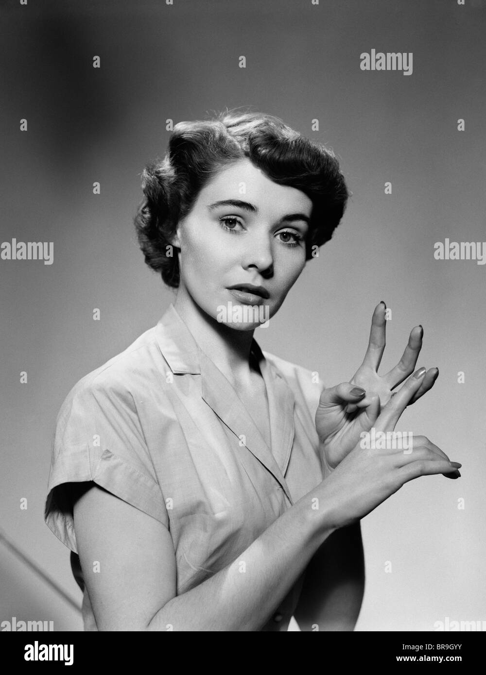Woman hands speaking Black and White Stock Photos & Images - Alamy