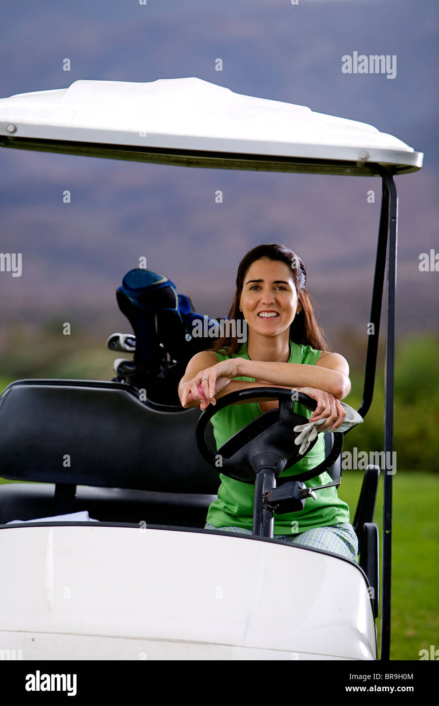 Woman athlete driving a golf cart in San Diego California Stock Photo ...