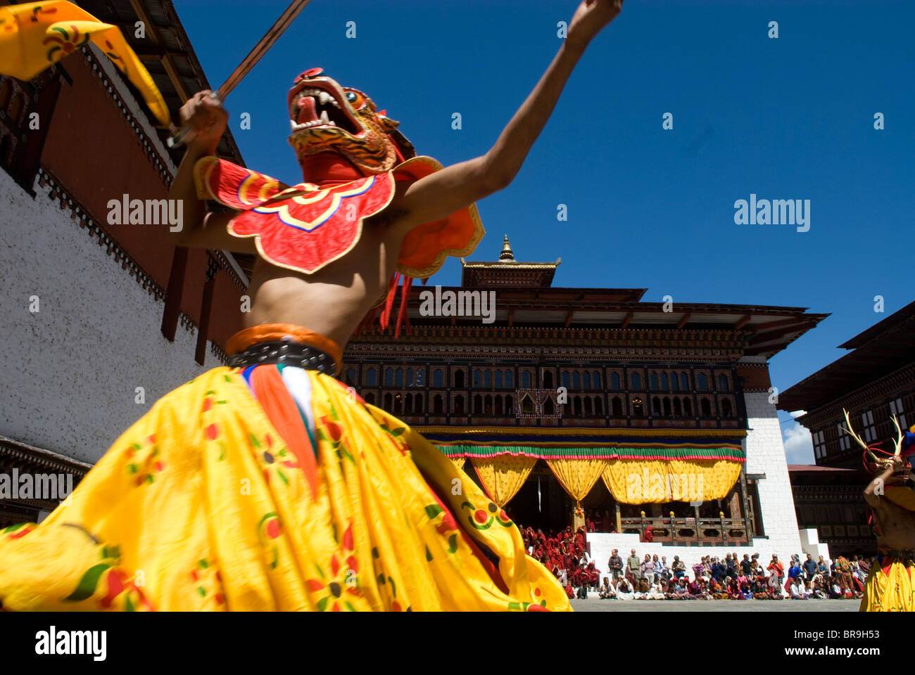A dancer performs a traditional religious dance in Bhutan's Thimpbu ...