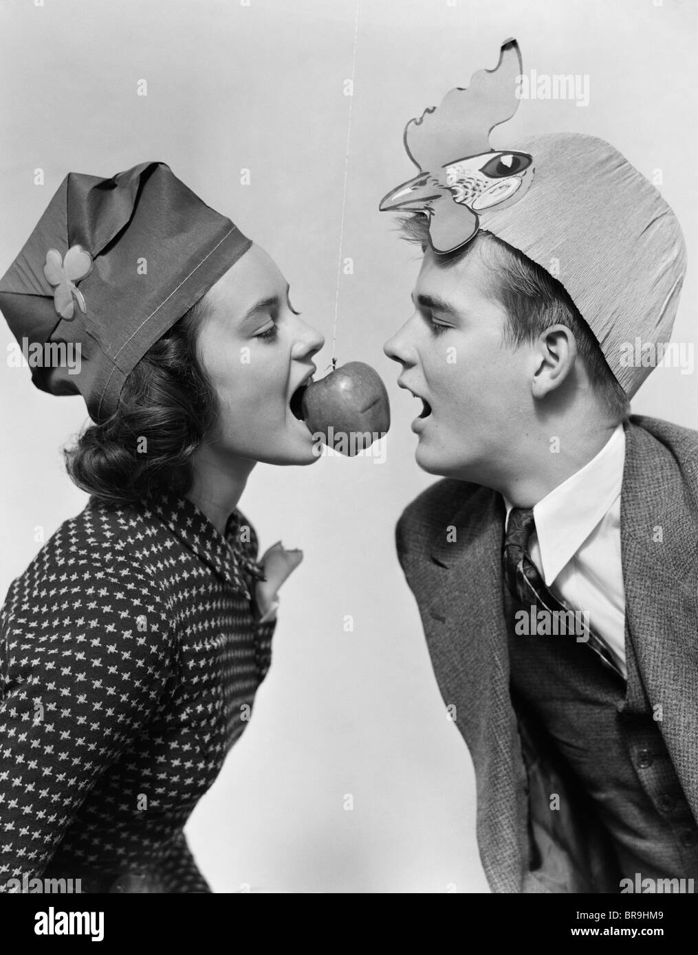 Apple bobbing adult hi-res stock photography and images - Alamy